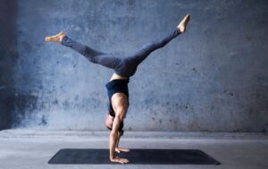 11 Yoga Inversions Benefits: From Digestion To Spinal Health + More