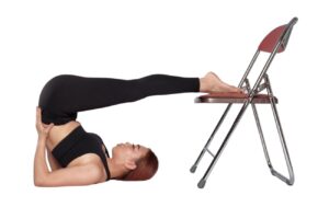 Plow Pose (Halasana): How To Do It Safely & Benefits